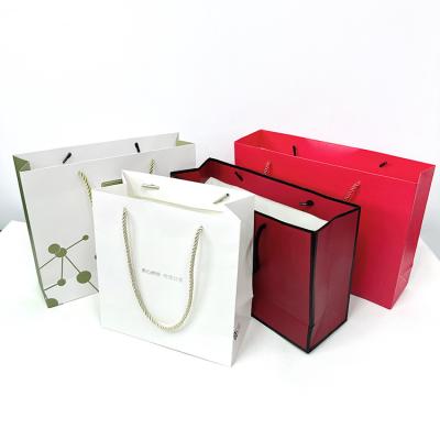 China Custom Kraft Paper Bag Packaging With Window for Gift Craft Recyclable and Smell Proof Te koop