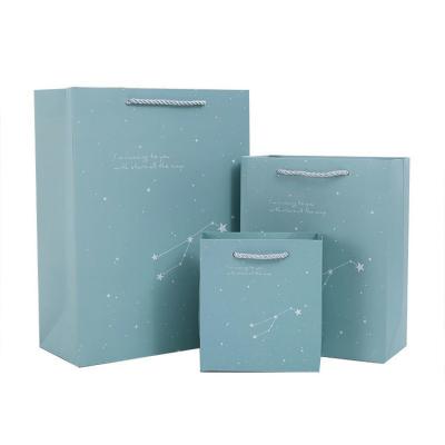 China Customized Color Eco Friendly 14X10X15 7.5 Inches Christmas Gift Bags with Logo Lamination à venda