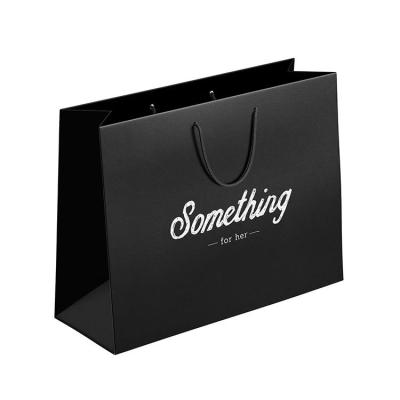 Cina Logo personalizzato accettato Offset stampa carta rosa sacchetto con maniglie in vendita