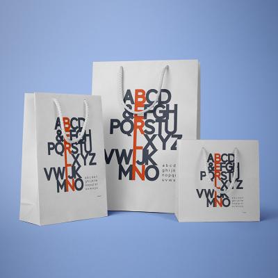 China Winkeltas van papier 14x10x15 inch met zwart-wit matte film en papier touw Te koop