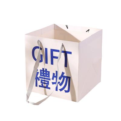 Cina Toowin Custom Black Ribbon Handle Gold Card Skincare Shop Sacchetto di carta bianca per alimentari in vendita