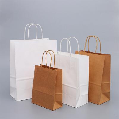 China Die Cut Kraft Paper Bag with Pink White Handle Customized Color and Popular Style for sale