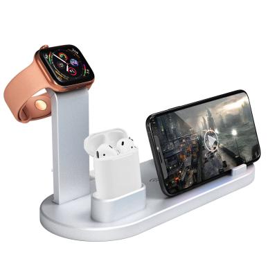 China Qi 4 in 1 Wireless Charger Portable Base for iPhone Mobile Earphone Support Multiple Type for sale