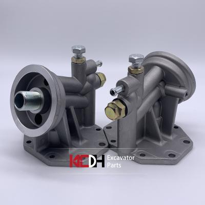 中国 312D 315D 320C 320D 323Dの掘削機の部品1R-0739の石油フィルターの基盤1R0739の空気fのために適したアルミニウム8穴の基盤 販売のため