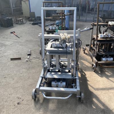 China Paving Block Making Machine Manual Interlocking Brick Machine Pallet Size 850*550*25mm for sale