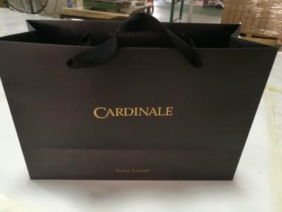 China Custom design black gift paper shopping carry package bag with handle for sale