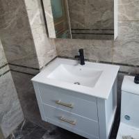 China Width Customized Freestanding Wall Bath Vanity Set Solid Wood Pvc Bathroom Vanities for sale