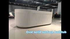 Oval solid surface bathtub