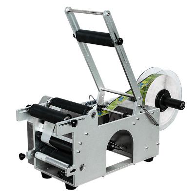 Cina Etichettatrice del piano manuale della bottiglia, applicatore autoadesivo dell'etichetta di accuratezza di 1mm in vendita