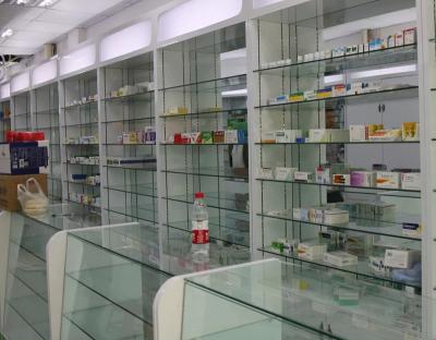China Customized Pharmacy Storage Cabinets Medicine Display Racks Glass Layer for sale
