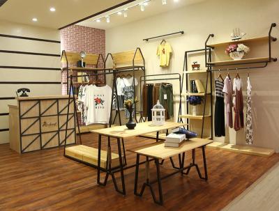 Cina Il negozio degli scaffali di esposizione dell'Clothing di signore durevoli copre la progettazione alla moda dello scaffale in vendita