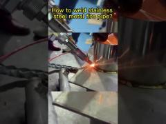 Hand-held laser welding machine welding stainless steel metal fire pipe.