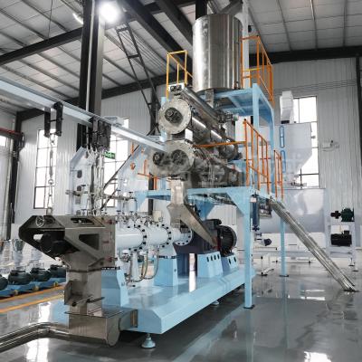 China Continuous & Automatic Twin Screw Extruder 70-110 mm Screw Diameter 380V/50Hz Pet Food Extruder Machine for sale