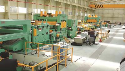 China Máquina de corte de guillotina de 20T de peso de bobina de velocidad para corte de longitud fija de bobina de acero en venta