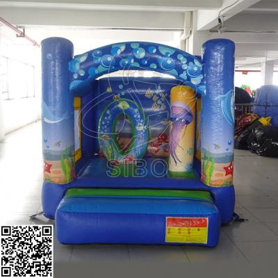 中国 0.4 + 0.55mm ポリ塩化ビニールの屋内運動場のための青く黄色く膨脹可能な跳ね上がりの家 販売のため