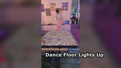 An interactive floor display panel integrated into the interior, featuring a sensor chip.