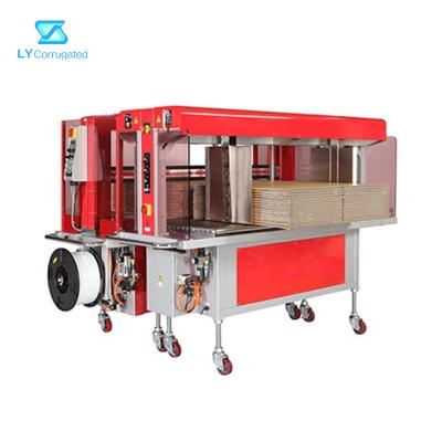 Cina PLC Control Carton Packing Machine PP Belt Strapper With Conveyor System in vendita