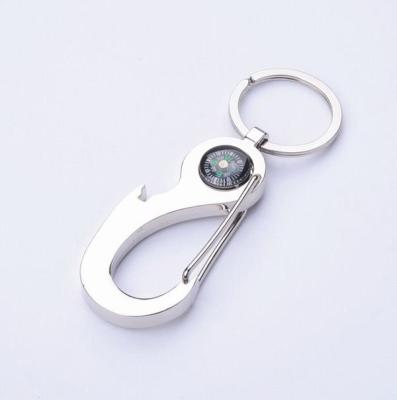 China Innovative Metal Cabariner Keychain Compass Bottle Opener for sale