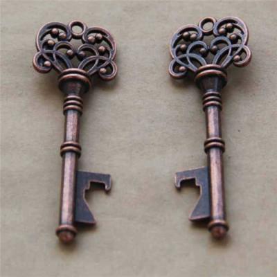 China Personalized Promotion Gift Innovative Wedding Favor Antique Copper Key Shape Beer Bottle Opener for sale