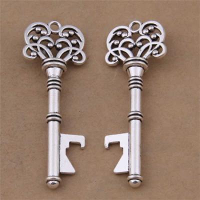 China Personalized Promotion Gift Innovative Wedding Favor Antique Silver Key Shape Beer Bottle Opener for sale