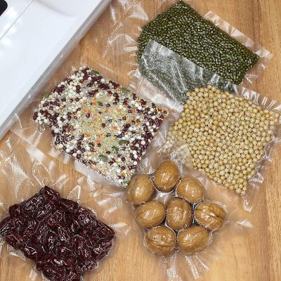Cina La dimensione su misura QS ha impresso le borse libere di stoccaggio di vuoto dell'alimento di Rolls BPA del sigillatore di vuoto in vendita