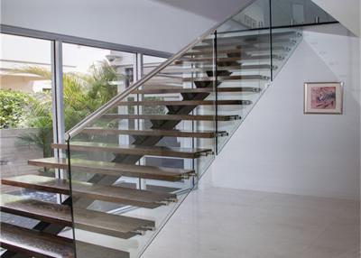 China 316s.s indoor straight wooden staircase with tempered clear glass railing for sale