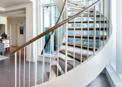 China 40mm rubber wood curved staircase with tempered clear glass railing top railing for sale