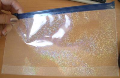 China La hoja transparente brillante del arco iris del paquete de la estrella de Bagease que se puede volver a sellar se levanta la bolsa para los pendientes que empaquetan embalar de las herramientas del cosmético en venta