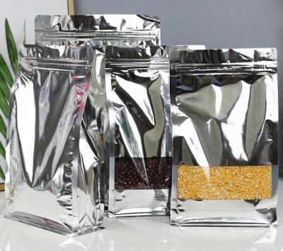 China El soporte del papel de aluminio encima de bolsas herméticas de empaquetado de la cremallera de Mylar de los bolsos huele al graduado de la comida del paquete de la muesca del rasgón del café K de la prueba en venta