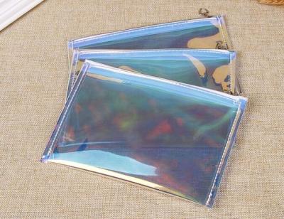 Chine Le cosmétique au néon de PVC d'espace libre de sac de sac olographe de couleur composent le sac en arc-en-ciel, sucrerie au néon lumineuse de dames de cadeau promotionnel de filles à vendre