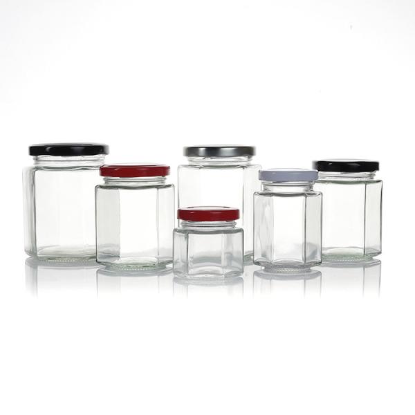 Quality Wholesale Price Available Different Sizes Full Foam Packing Hexagonal Honey Jars Glass for sale