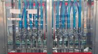 China Automatic Irregular Bottle Functional Beverage Filling Machine with Servo Diving Filling and Tracking Capping System for sale