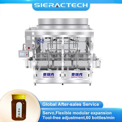 China Automatic Honey Filling Machine with Servo Piston Control and Heated Anti-Drip Filling System for sale
