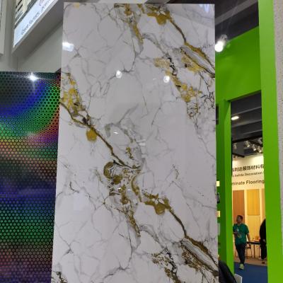 China Pvc Wpc Well Uv Wall Panel Marble Sheet Gold and White Large Effect PVC PANEL WALL Panels Pvc for sale
