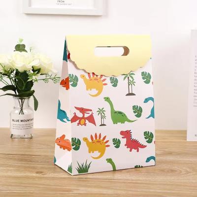 Cina L'abitudine ha stampato i piccoli bambini di Goodie la golosità della carta kraft che del regalo insacca per le feste di compleanno in vendita