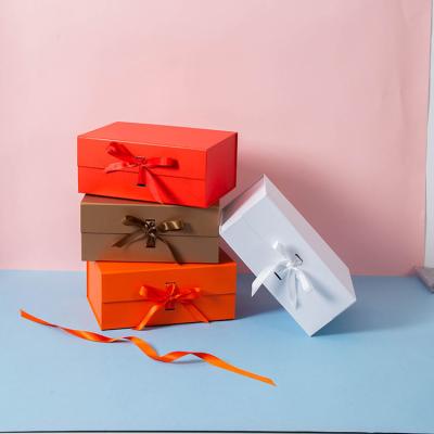 China Folding Rigid Candy Boxes Corrugated Cardboard Clothing Gift Box For Holiday for sale