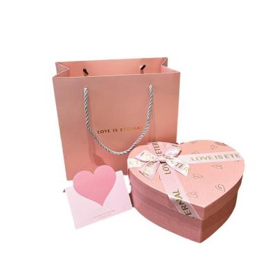 China Greeting Card Rigid Presentation Boxes Pink Heart Box With Tote Bag Customizable for sale