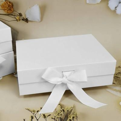 China Ivory Foldable Gift Boxes Cosmetic Custom Logo  Flip Top Magnetic Box for sale