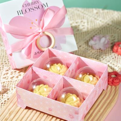 China Handle Qingtuan Folding Paper Packaging Box Glossy Lamination Blossom Gift Boxes for sale