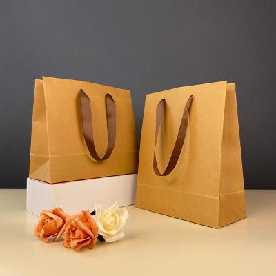 China Kraft Paper Gifts Bags With Handle Accept Custom Logo Printing Packaging Tote Bags for sale