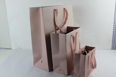 Cina Rosa fumosa 250gam ha ricoperto il sacchetto della spesa del cartone di maniglie in vendita