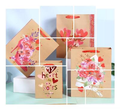 Cina Sacchi di carta di Kraft di Natale della maniglia del nastro che decorano il sacco di carta per il San Valentino in vendita