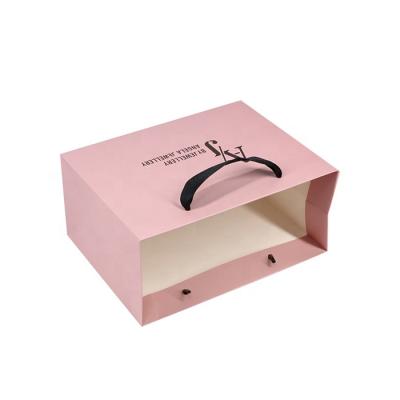 Cina La laminazione lucida calza i sacchi di carta che dell'abbigliamento 250gam ha ricoperto le borse rosa di Kraft in vendita