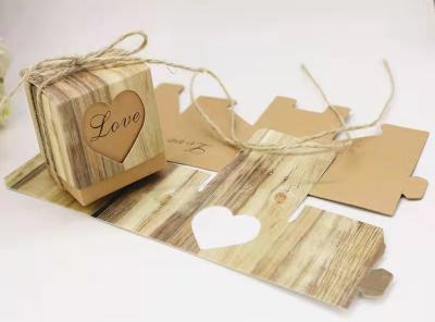 Cina Il laser ha tagliato le scatole di favore della festa di compleanno della scatola di carta 5x5x5cm di nozze del cuore in vendita