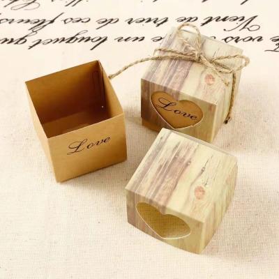 Cina Il laser ha tagliato le scatole di favore della festa di compleanno della scatola di carta 5x5x5cm di nozze del cuore in vendita