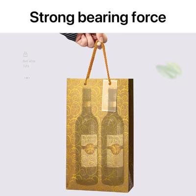 Cina La bottiglia di vino di timbratura calda del doppio di 190gsm Kraft insacca il trasportatore del vino della bottiglia della maniglia 2 della corda dei pp in vendita