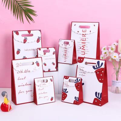 Cina scatola attuale 40cm*12cm*30cm del bordo di avorio dei sacchi di carta della stampa della fragola 130gsm in vendita