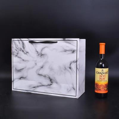 Cina sacchi di carta cosmetici 32*43cm di 20*28cm 26*35cm con le maniglie del nastro in vendita