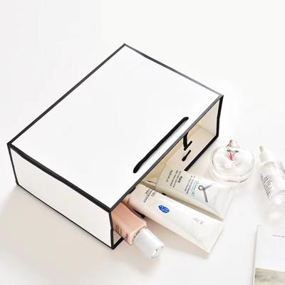 Cina Cosmetici tre borse d'imballaggio del boutique del bordo di avorio del sacco di carta dell'abito della corda delle sezioni in vendita
