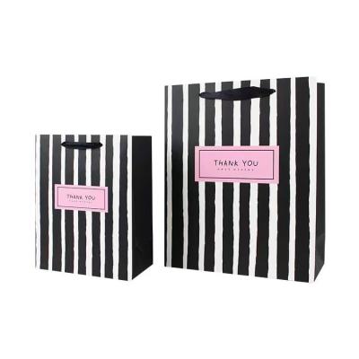 Cina la maniglia del nero 128-250gram ha laminato la pubblicità di Art Paper Bag For Apparel in vendita